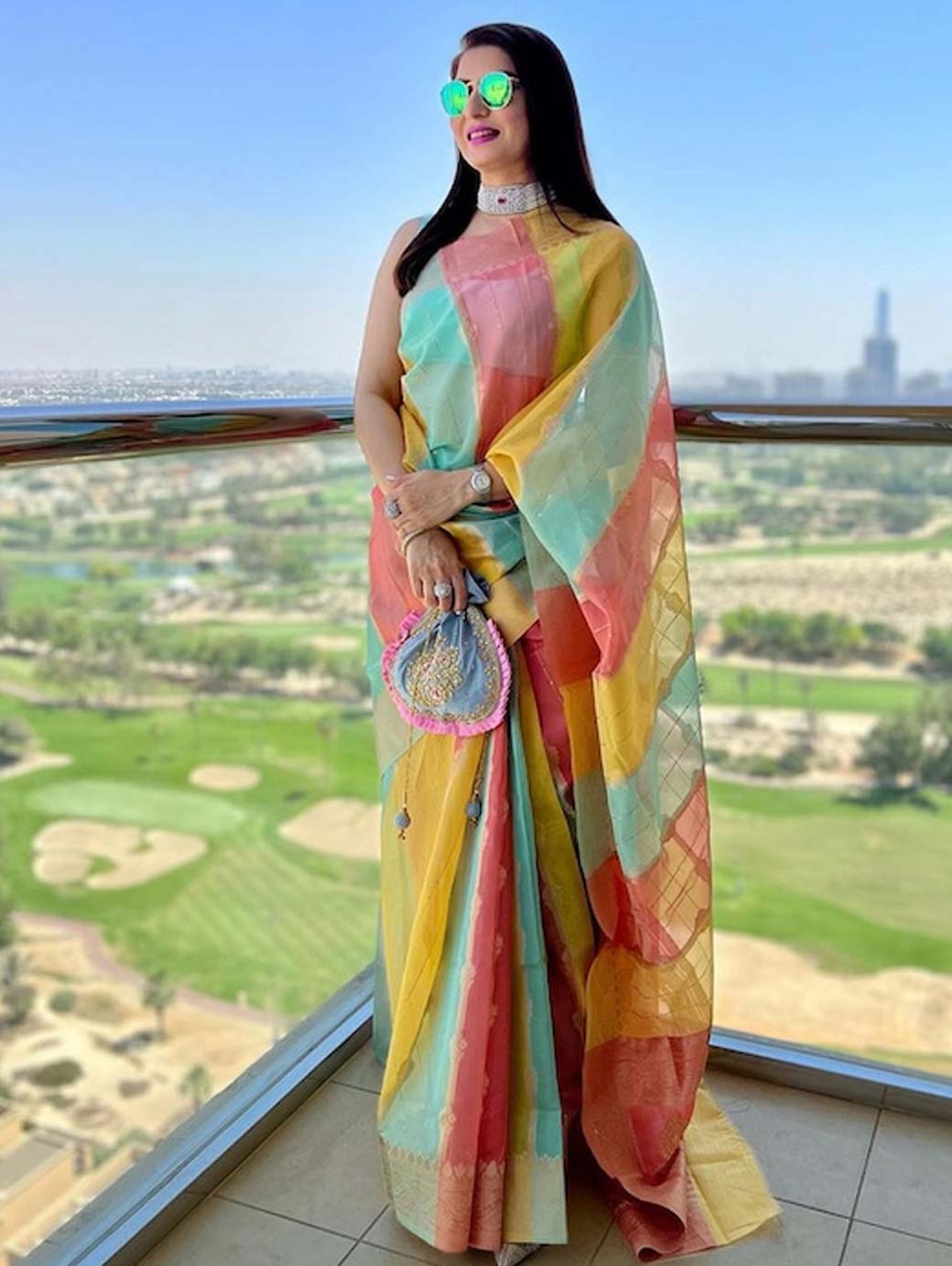Peach Coloured And Blue Ethnic Motifs Organza Saree